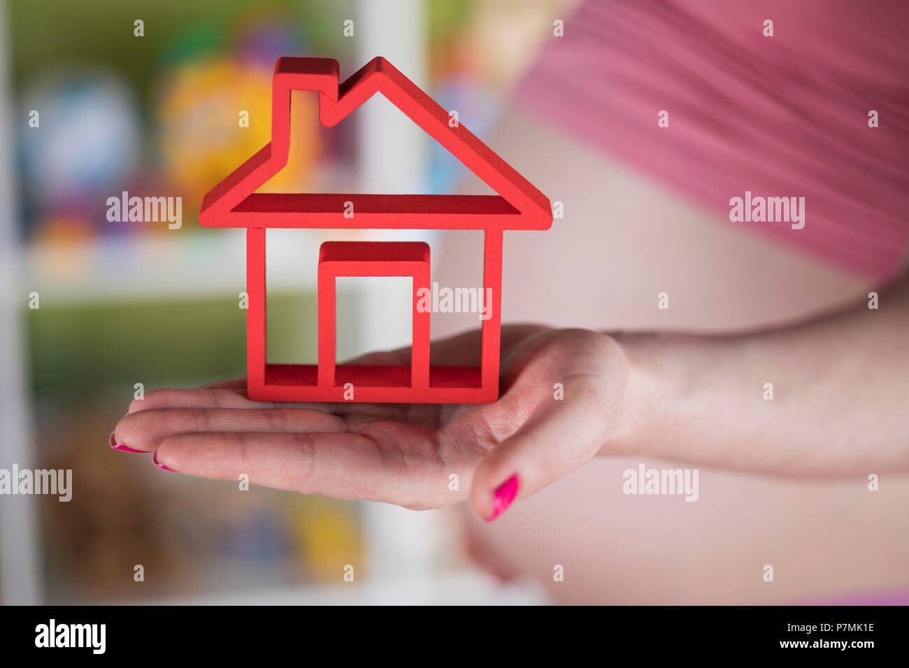 Pregnant house concept, of new home and family Stock Photo - Alamy
