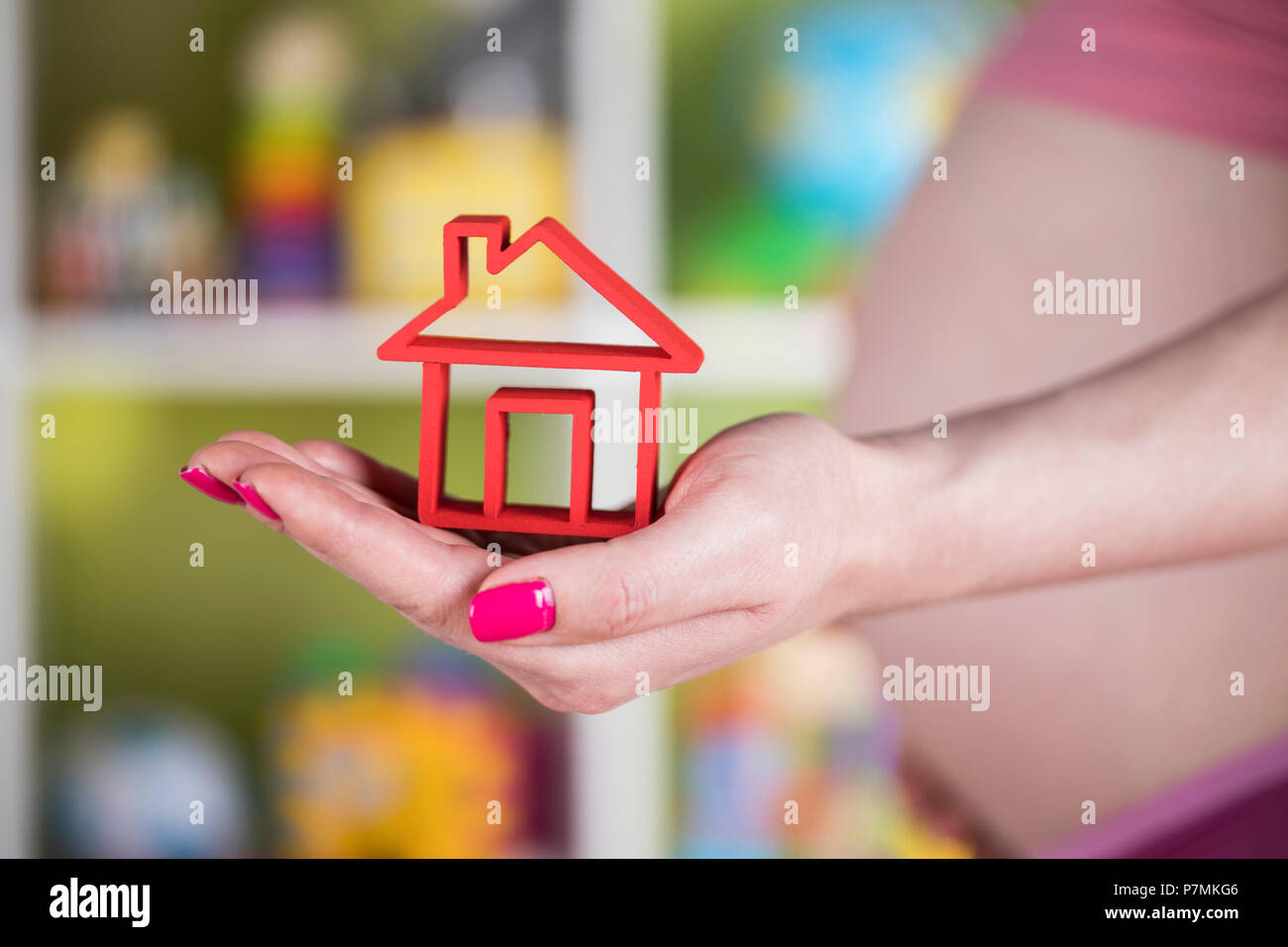 Pregnant house concept, of new home and family Stock Photo - Alamy