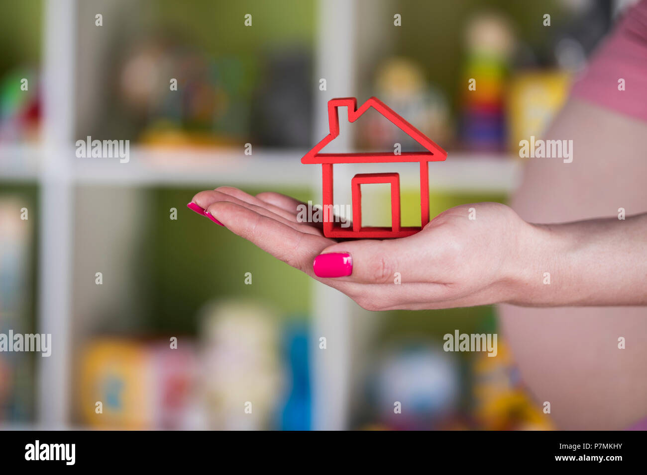 Pregnant house concept, of new home and family Stock Photo - Alamy