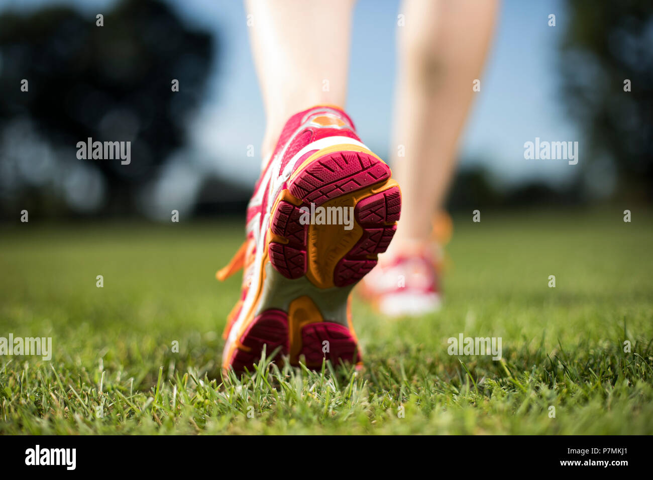 Woman fitness, Runner feet running Stock Photo - Alamy