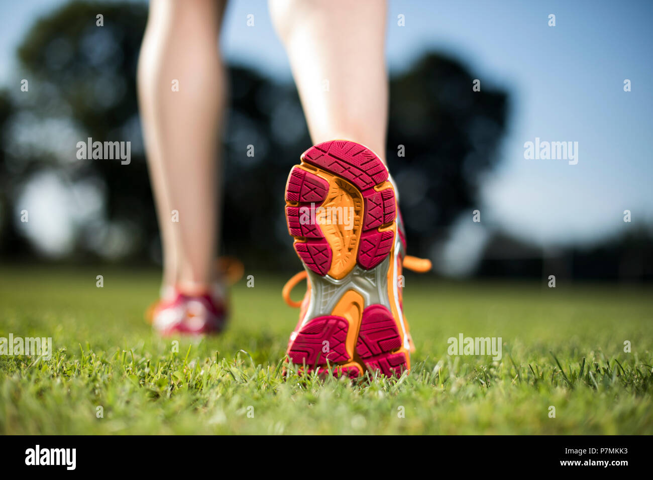 Woman fitness, Runner feet running Stock Photo - Alamy
