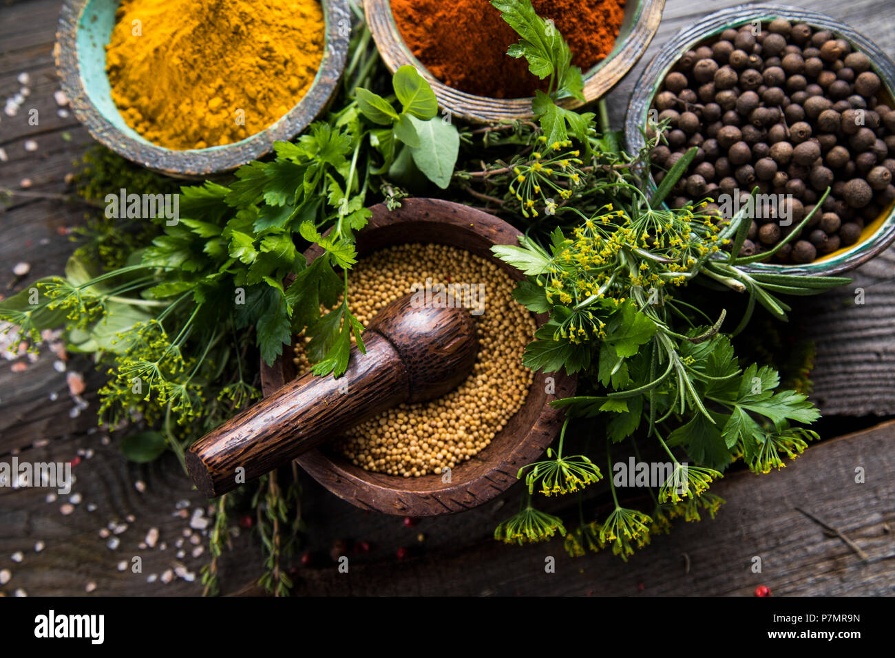 Hot spices in wooden bowls Stock Photo - Alamy