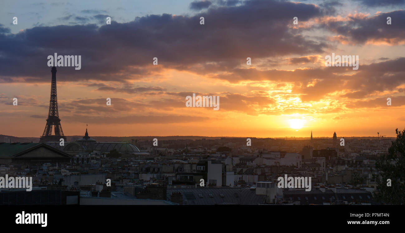 Sunset above Paris with Eiffel tower background Stock Photo - Alamy