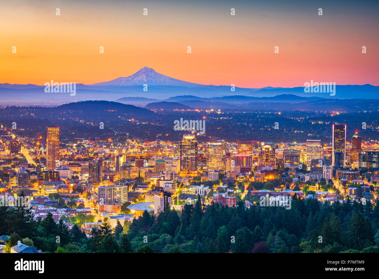 Portland, Oregon, USA skyline at dusk with Mt. Hood in the distance ...