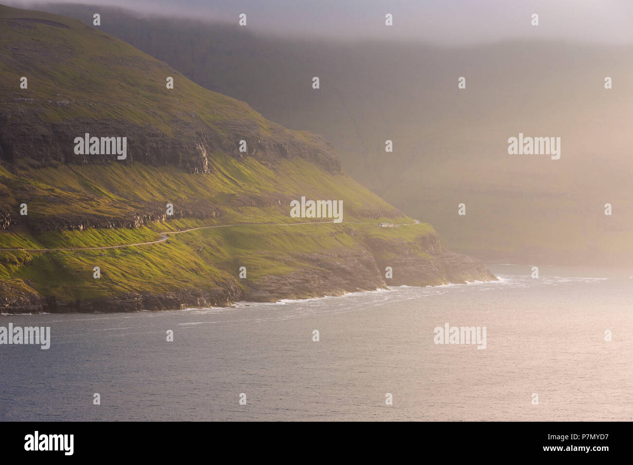 Road on cliffs towards Eidi, Eysturoy Island, Faroe Islands, Denmark ...