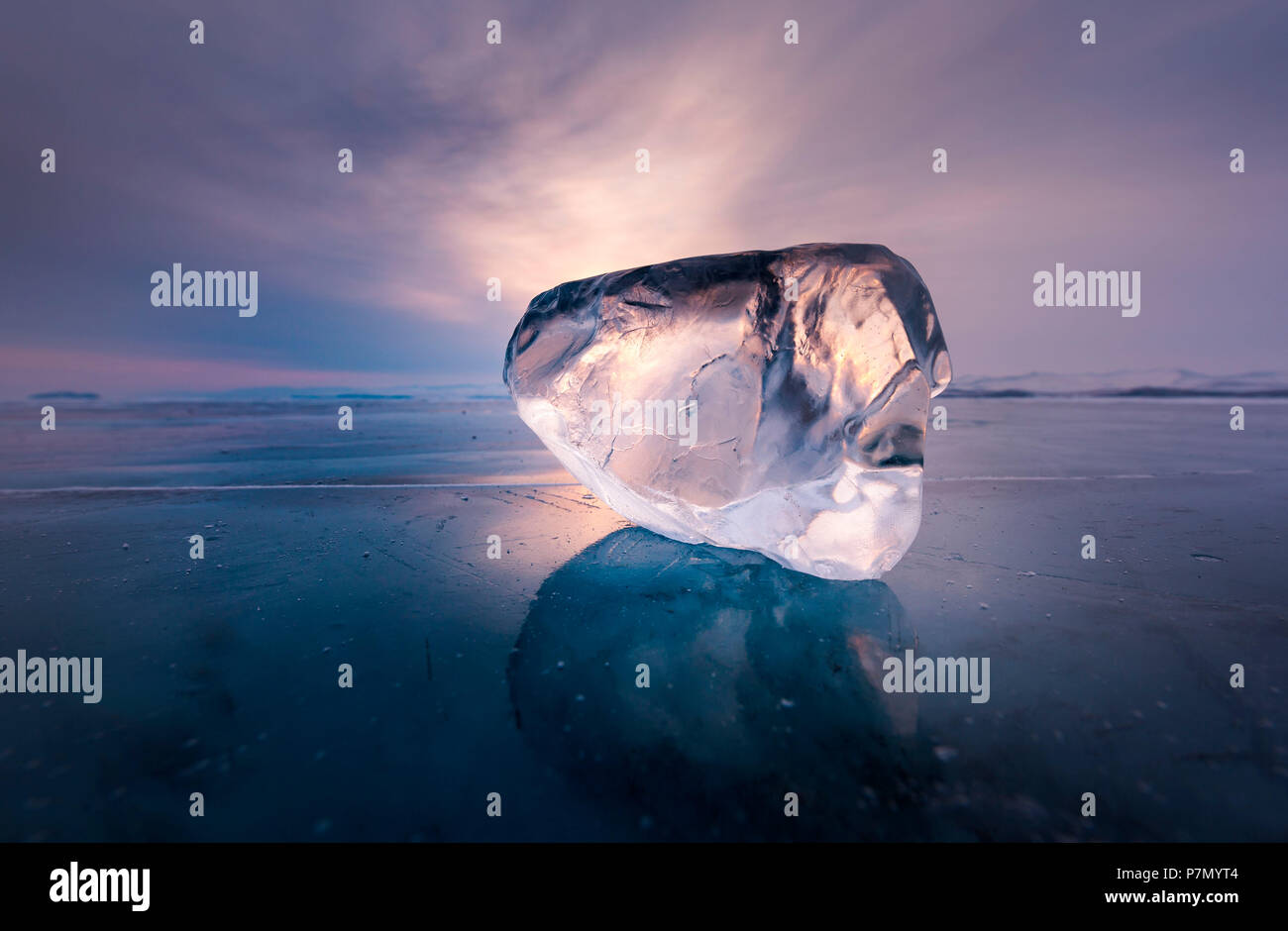 Piece of ice with sun reflection at lake Baikal, Irkutsk region ...