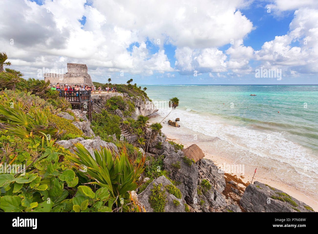 Tourists at El Castillo Pyramid, Tulum archeological site, Tulum ...