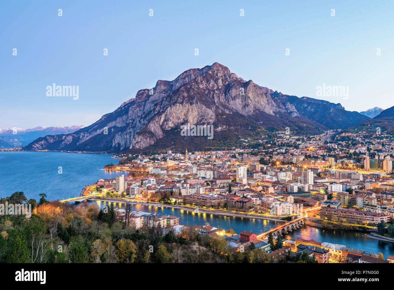 Elevated view of Lecco city with its 3 bridges. Lecco, Como lake ...