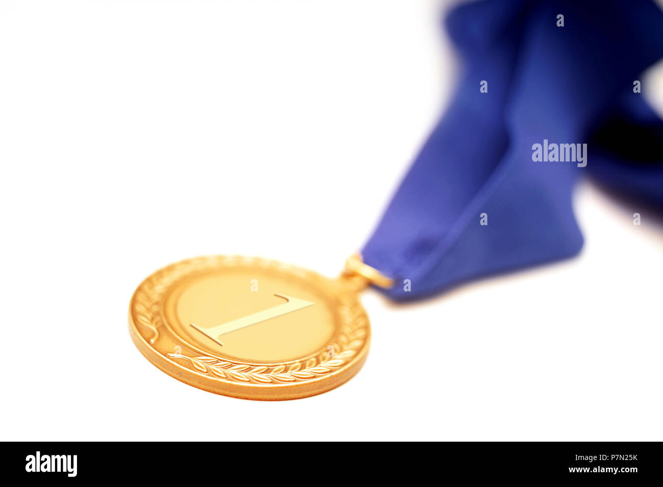 close up shot of first place gold medal Stock Photo - Alamy
