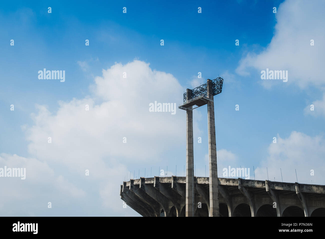 Sports Light with back stadium blue sky background Stock Photo - Alamy