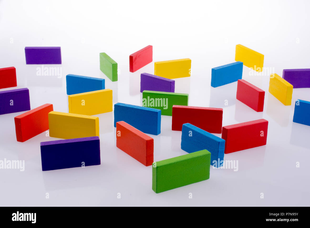 Color dominoes on a white background Stock Photo - Alamy