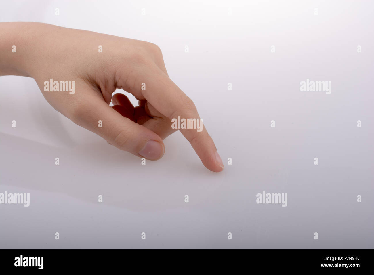 Hand pointing on a white background Stock Photo - Alamy