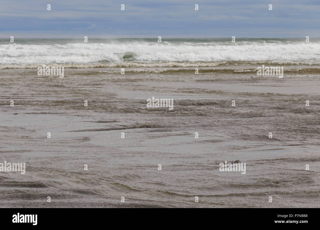 Incoming waves on beach hi-res stock photography and images - Alamy