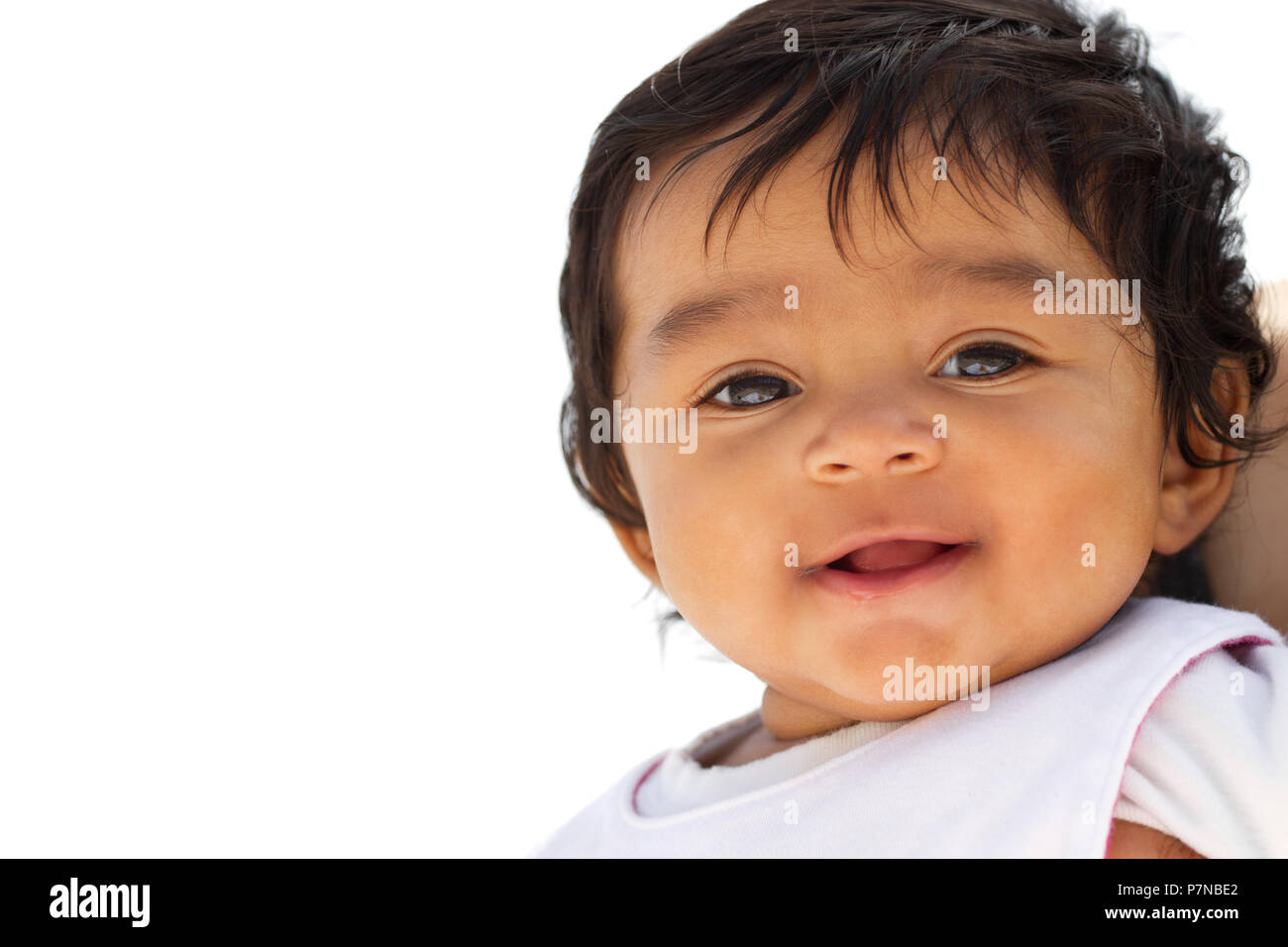 Portrait of a cute little Hispanic baby smiling Stock Photo - Alamy