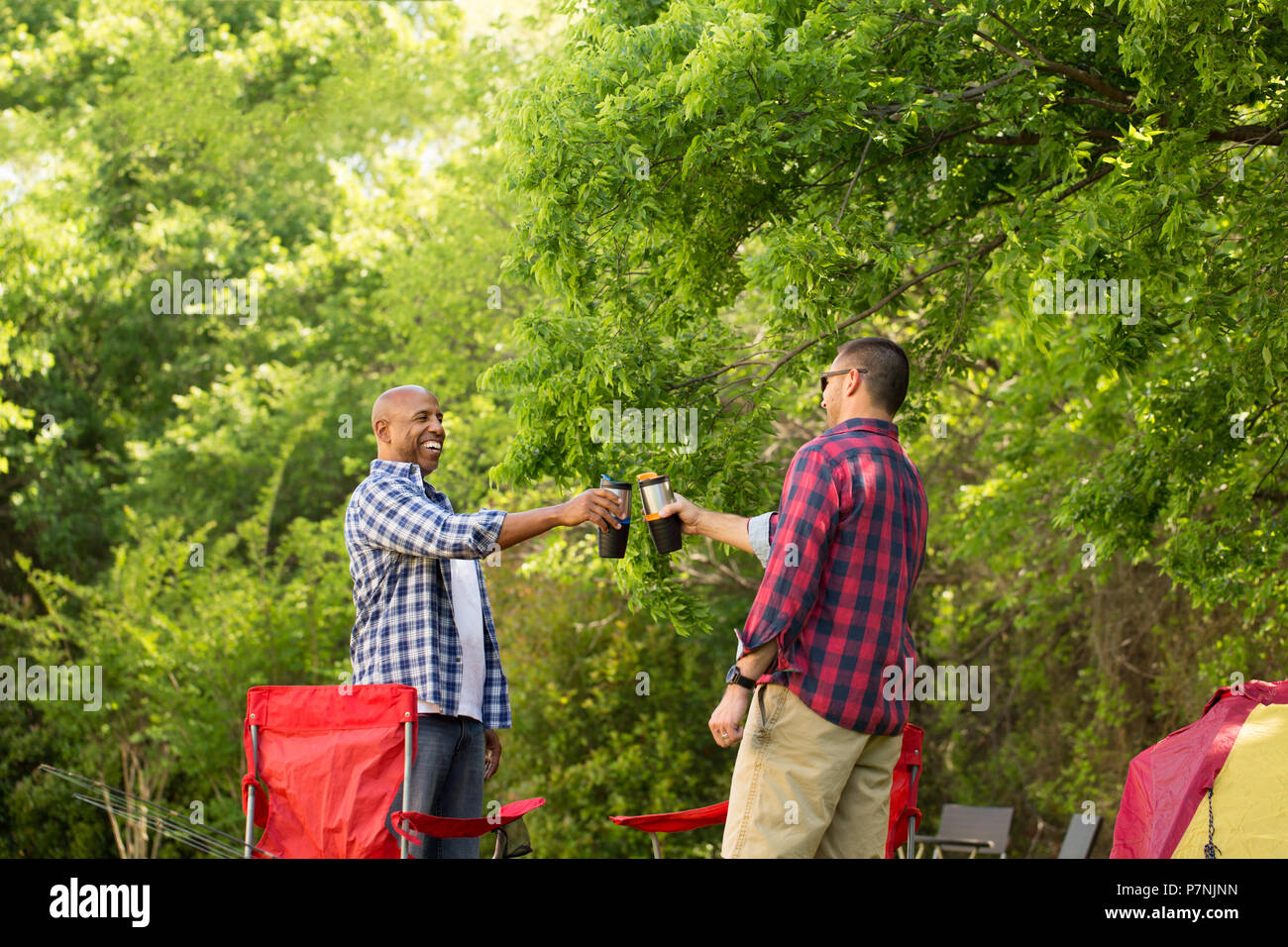 Friends camping men only hi-res stock photography and images - Alamy