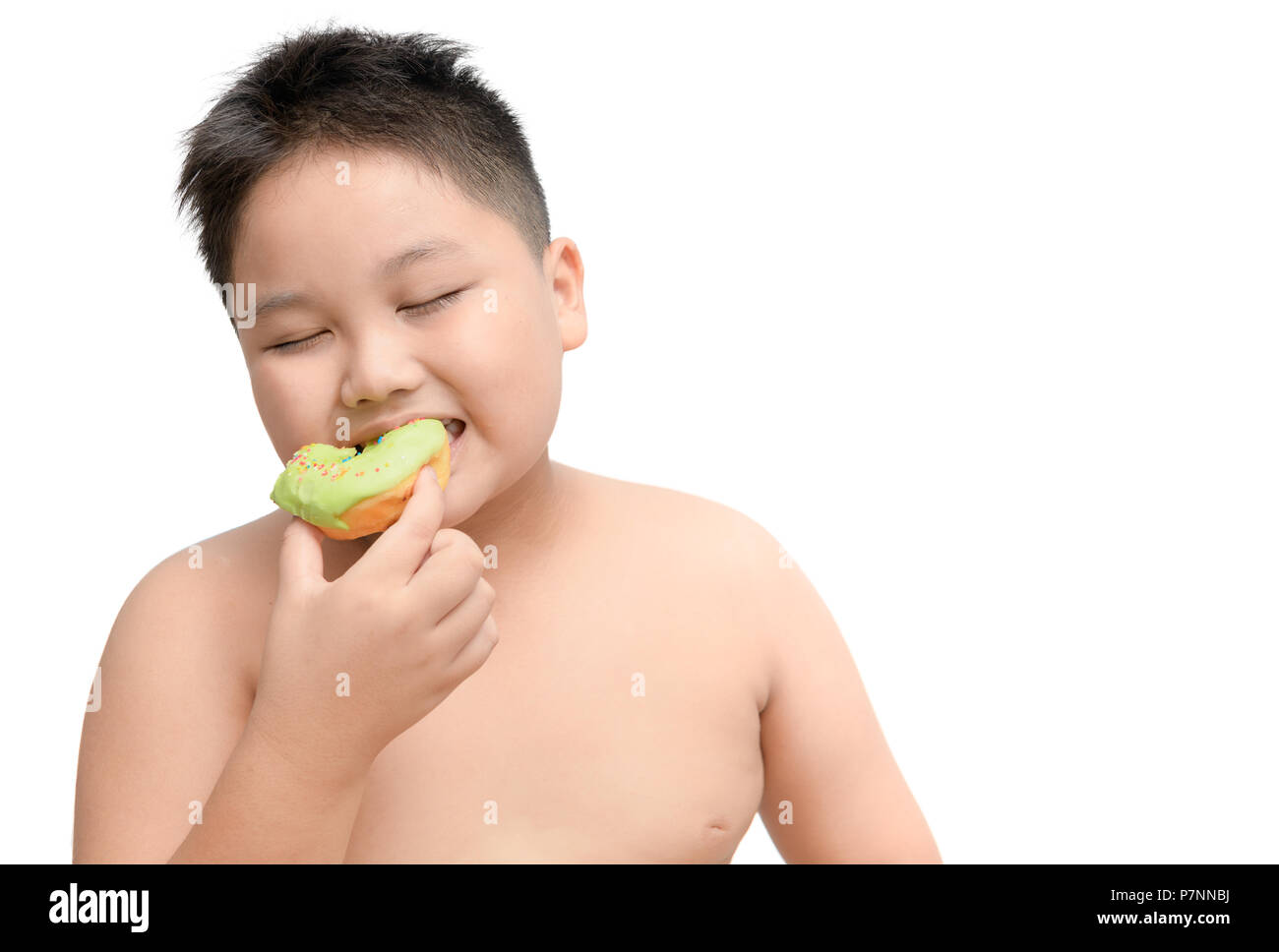 Overweight Child Eating Junk Food Stock Photo: 269990695 - Alamy