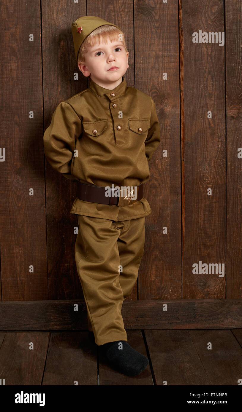 children are dressed as soldier in retro military uniforms Stock Photo ...