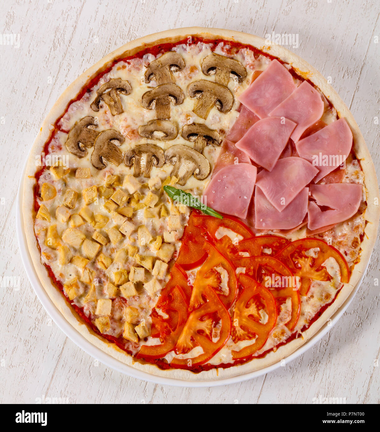 Pizza assortment mix with ham and mushrooms Stock Photo - Alamy