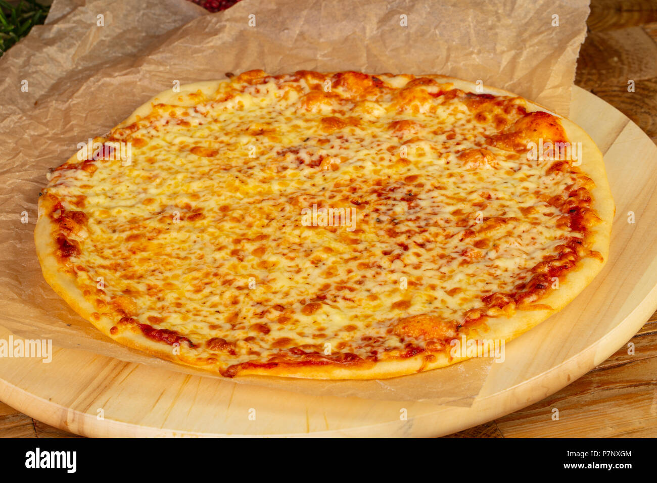 Big delicious cheesy Margarita pizza Stock Photo - Alamy