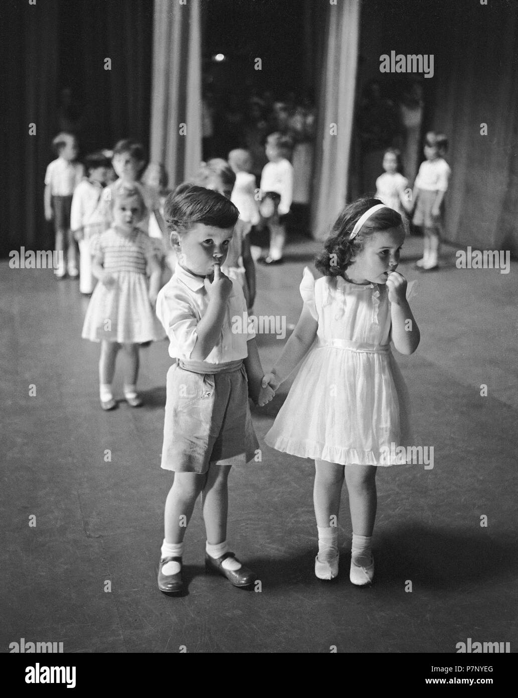 Boy shy with a girl, line up to dance, England, Great Britain Stock ...