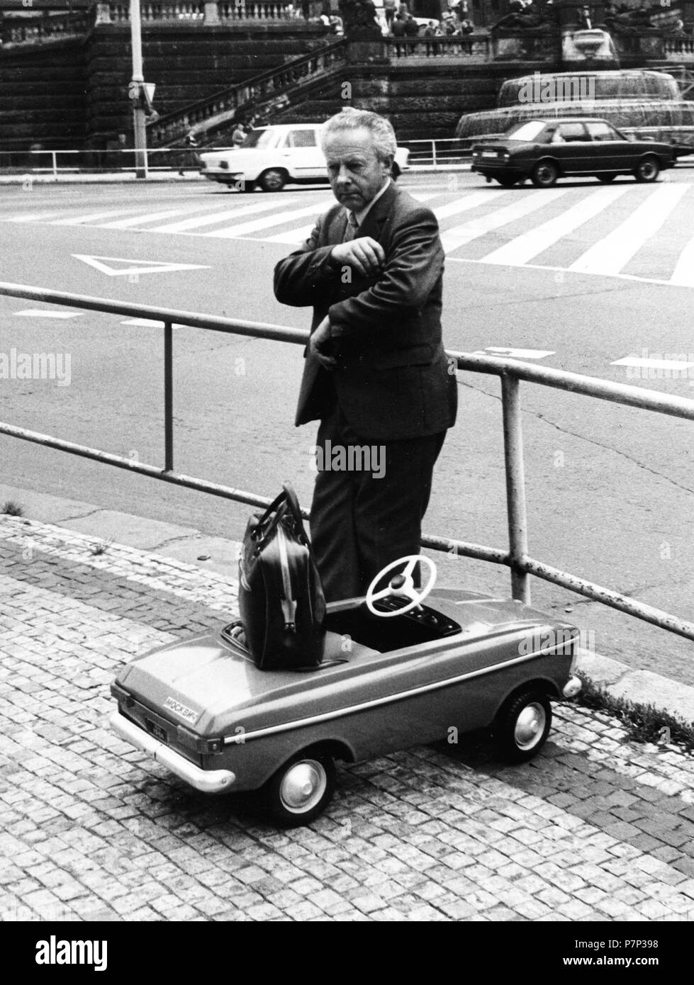 Man play toy car Black and White Stock Photos & Images - Alamy
