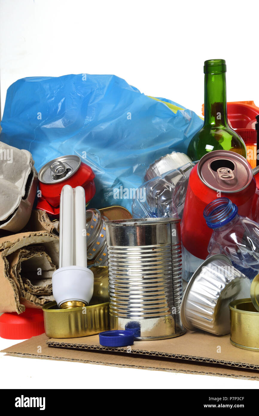 trash for recycling with,paper, glass bottles, cans, plastic bottle and ...