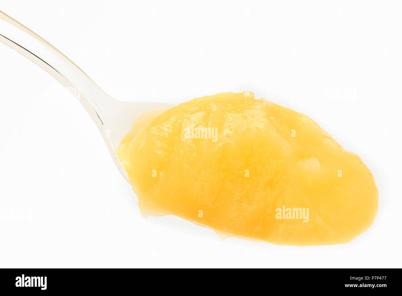 lemon curd on spoon Stock Photo - Alamy