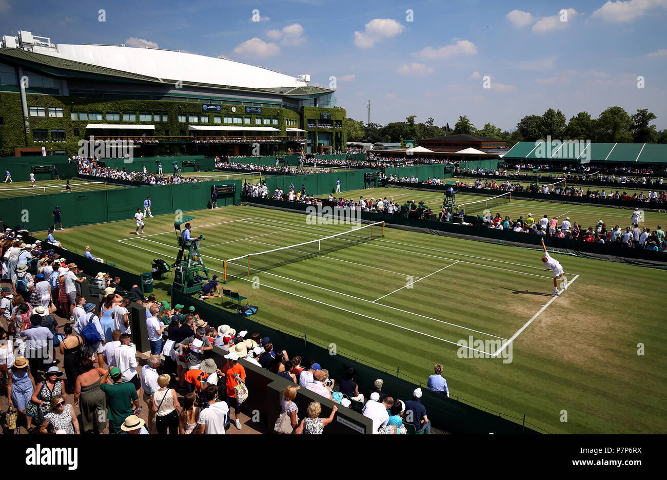 Spectators watch the action on the outside courts on day six of the ...