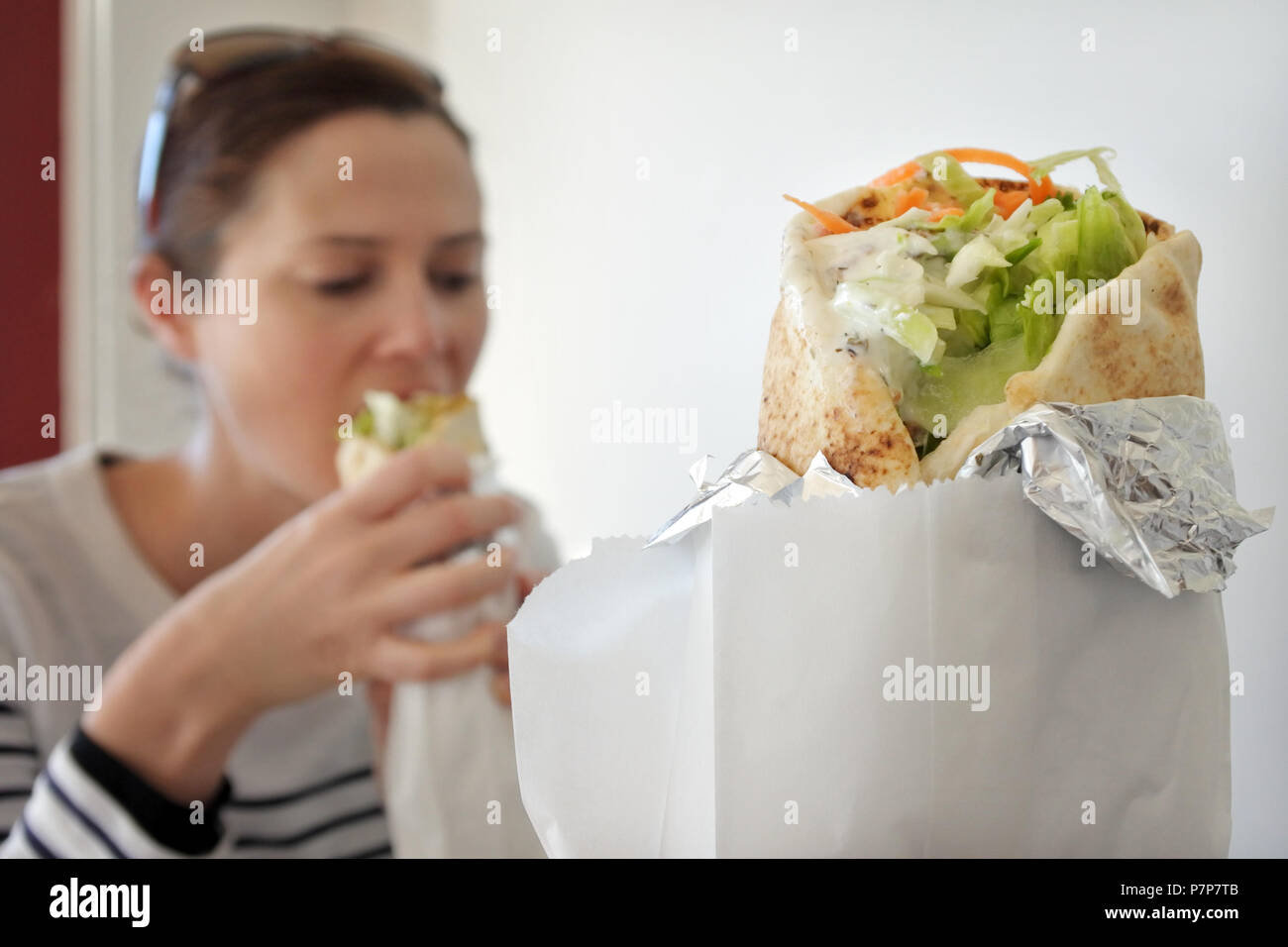 Woman Eating Wrap High Resolution Stock Photography and Images - Alamy