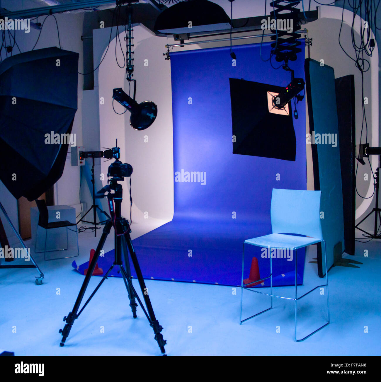 Photography Studio with a blue backdrop Stock Photo - Alamy