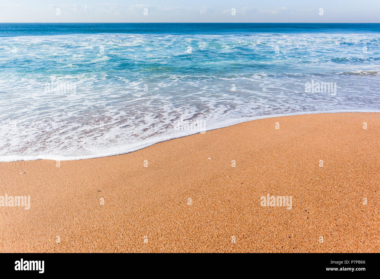 Beach shoreline blue ocean wave wash closeup scenic nature horizon ...