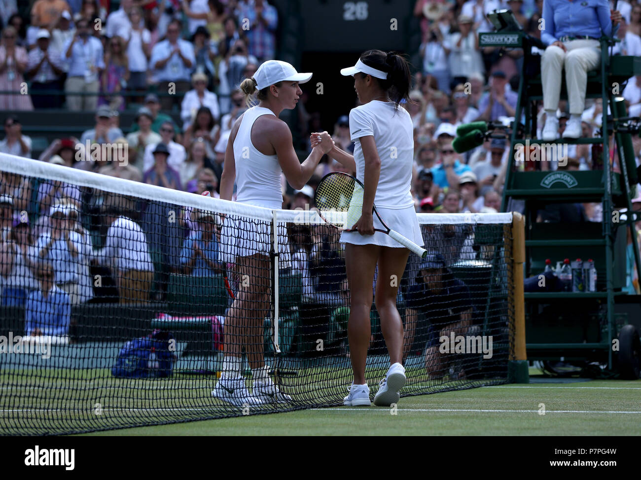 Su-Wei Hsieh (right) and Simona Halep shake hands after their match on ...