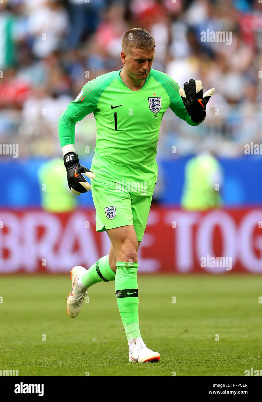 England goalkeeper Jordan Pickford shakes his wrist during the FIFA ...