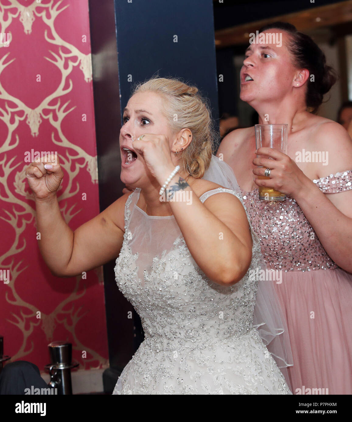 football mad bride Nadine Hanlon reacts whilst watching the FIFA World ...