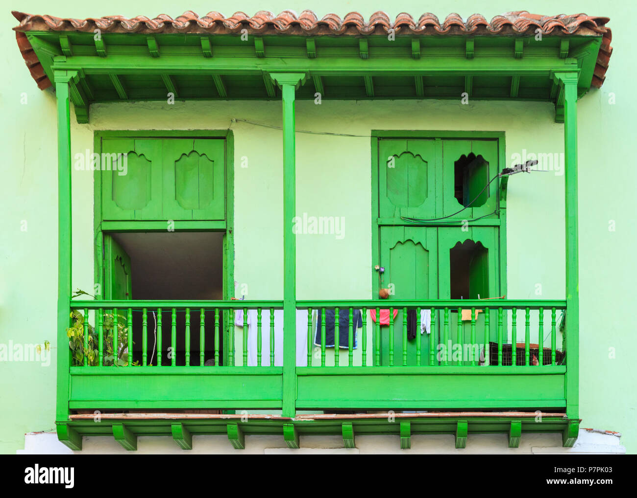 Traditional balcony, painted bright green on a house in Habana Vieja ... Traditional balcony, painted bright green on a house in Habana Vieja ...