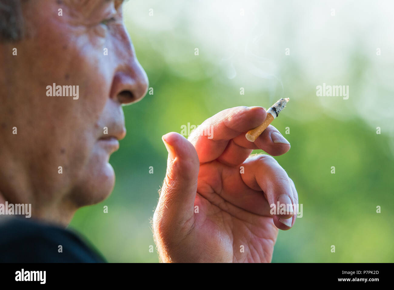 Older smoker hi-res stock photography and images - Alamy
