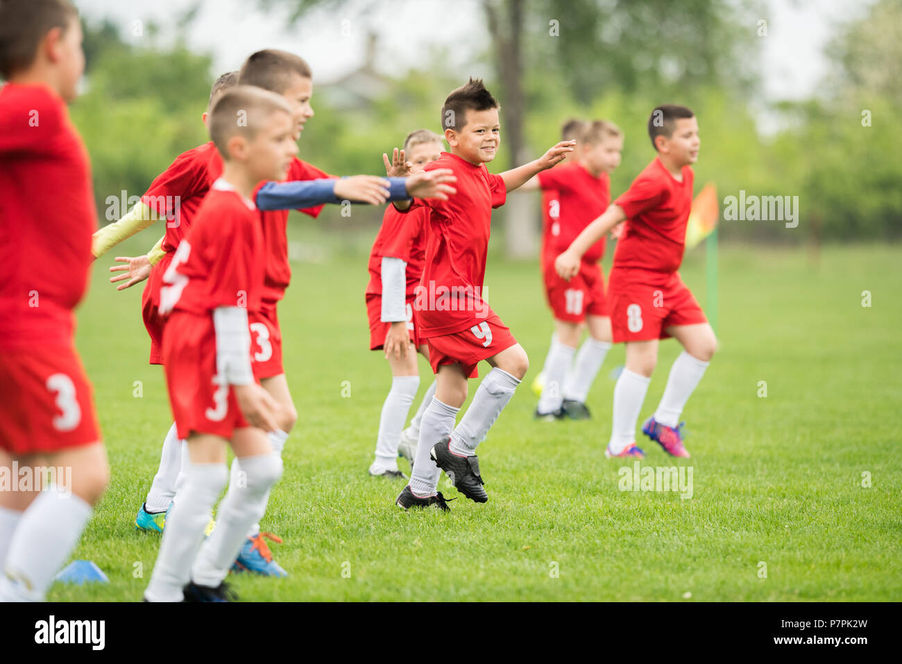 Kids soccer football - small children players exercising before match ...