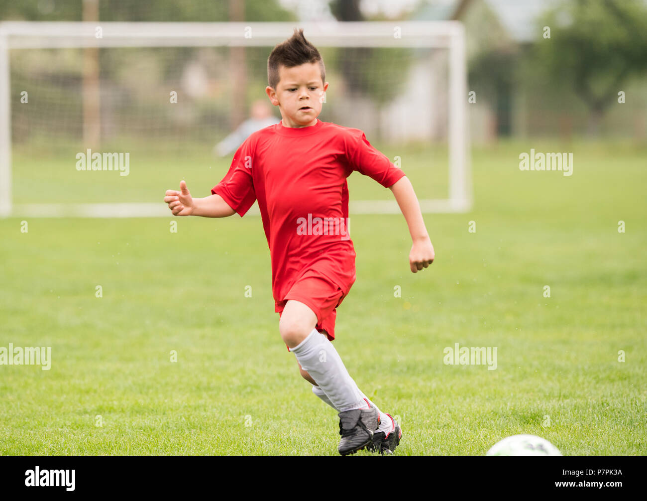 Kids soccer football - young children players match on soccer field ...