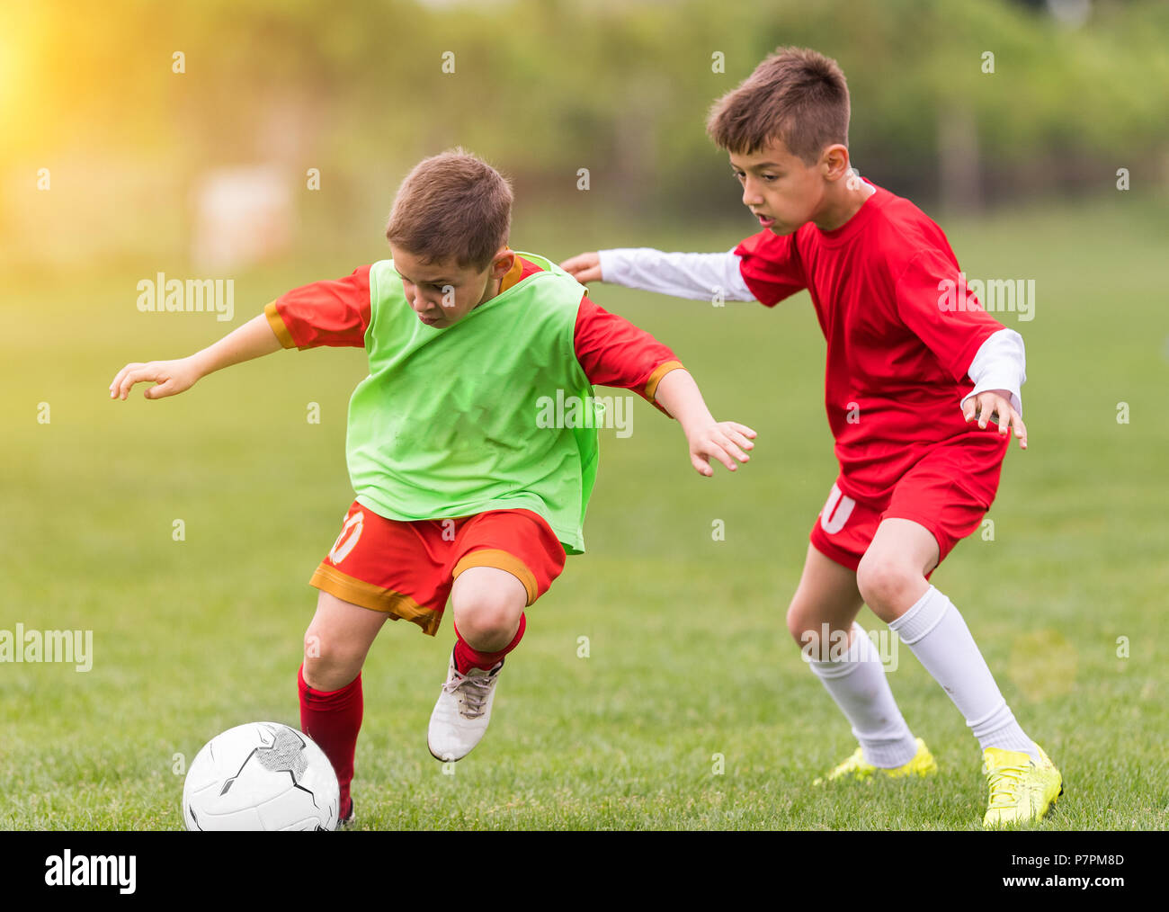 Kids soccer football - young children players match on soccer field ...
