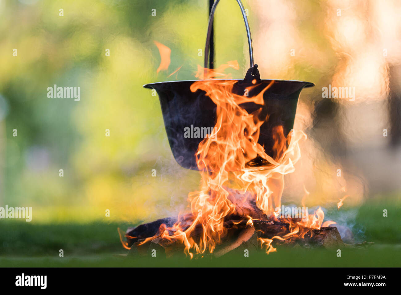 Family cooking kettle flame hi-res stock photography and images - Alamy