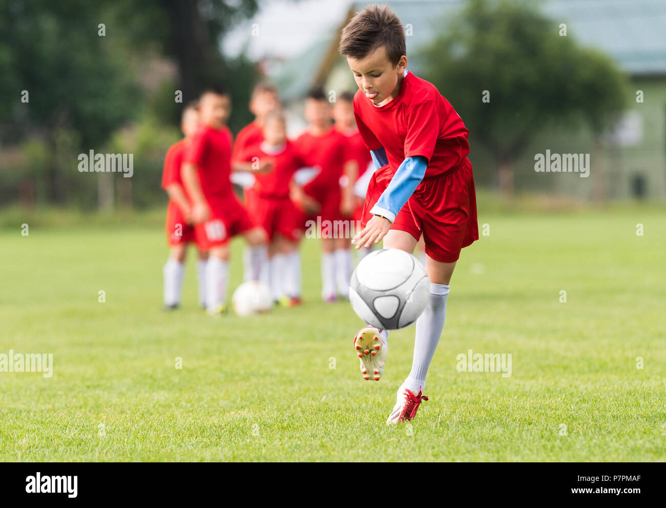 Kids soccer football - young children players match on soccer field ...