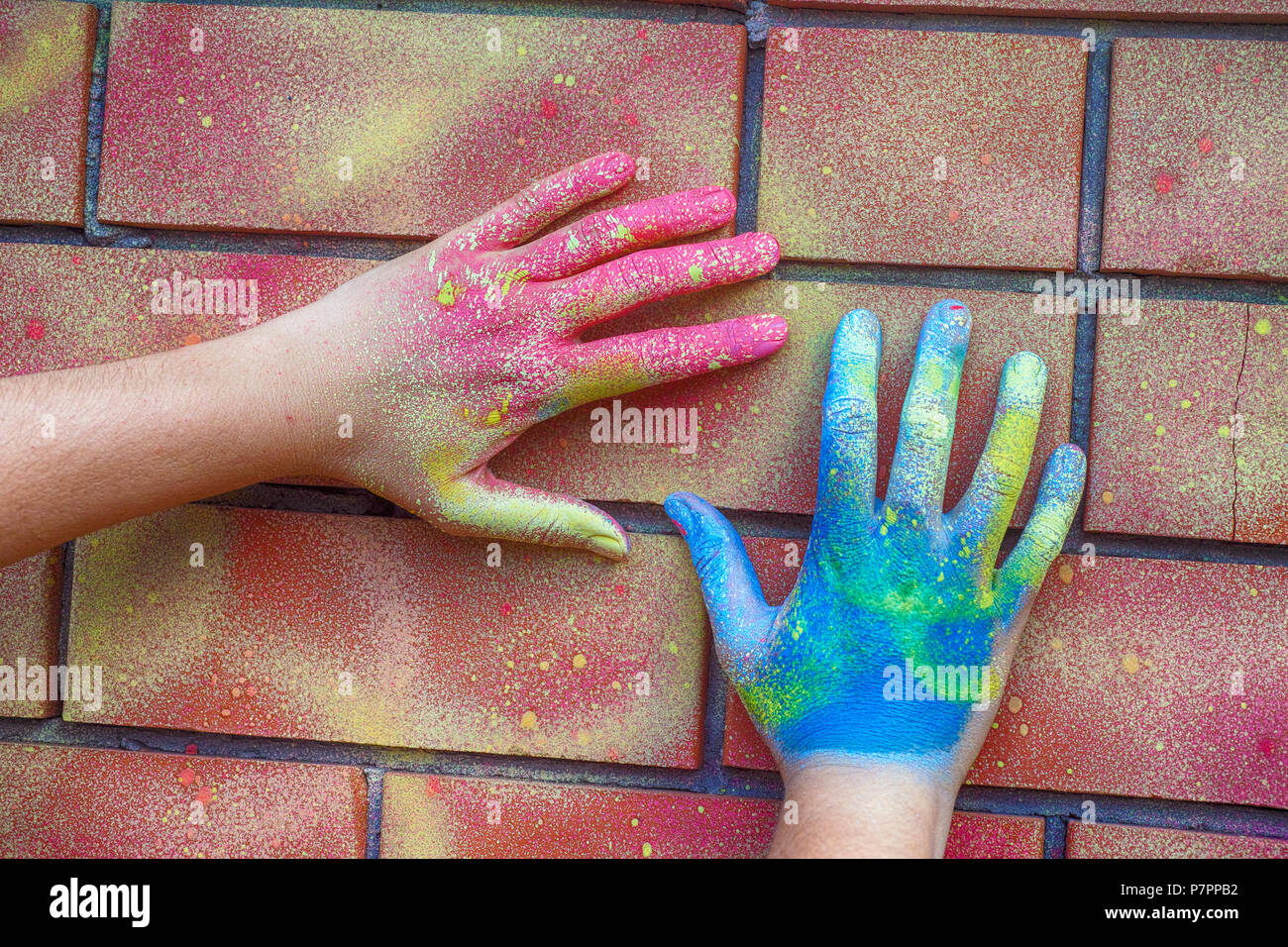 Hands on wall hi-res stock photography and images - Alamy