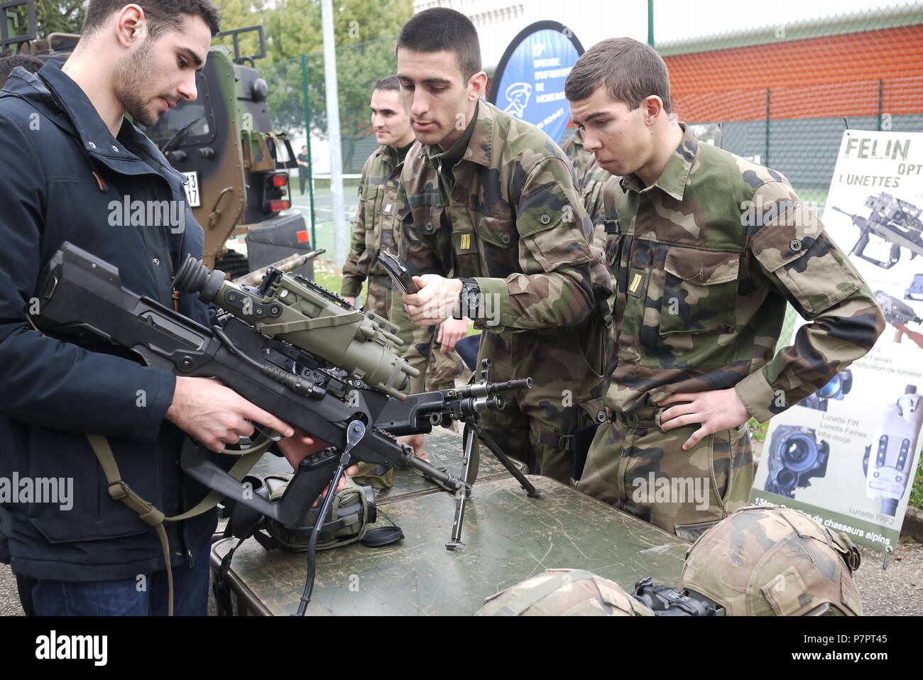 Students attend military exhibition at INSA higher School, Villeurbanne ...