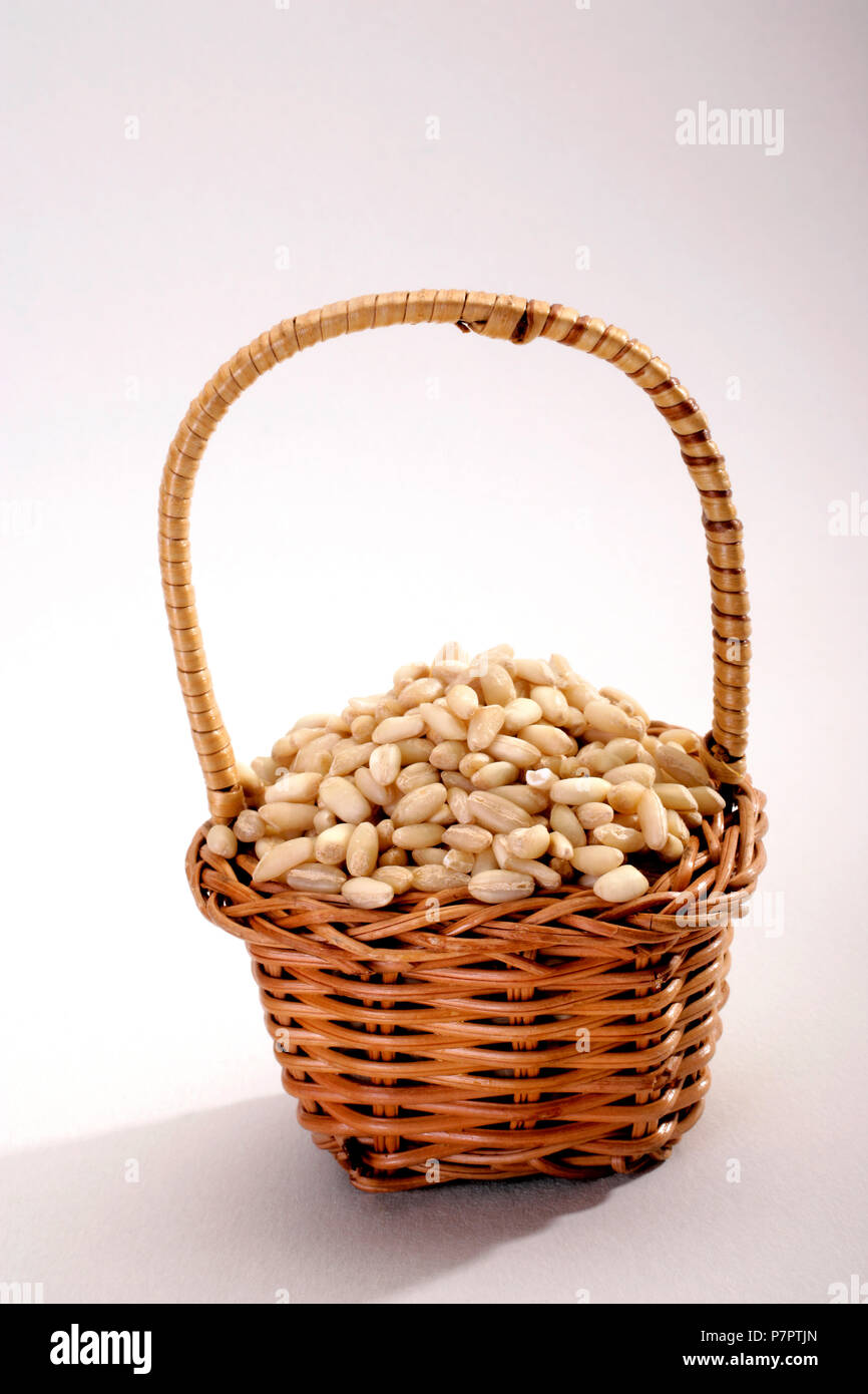 wheat grain in a basket on white background Stock Photo - Alamy