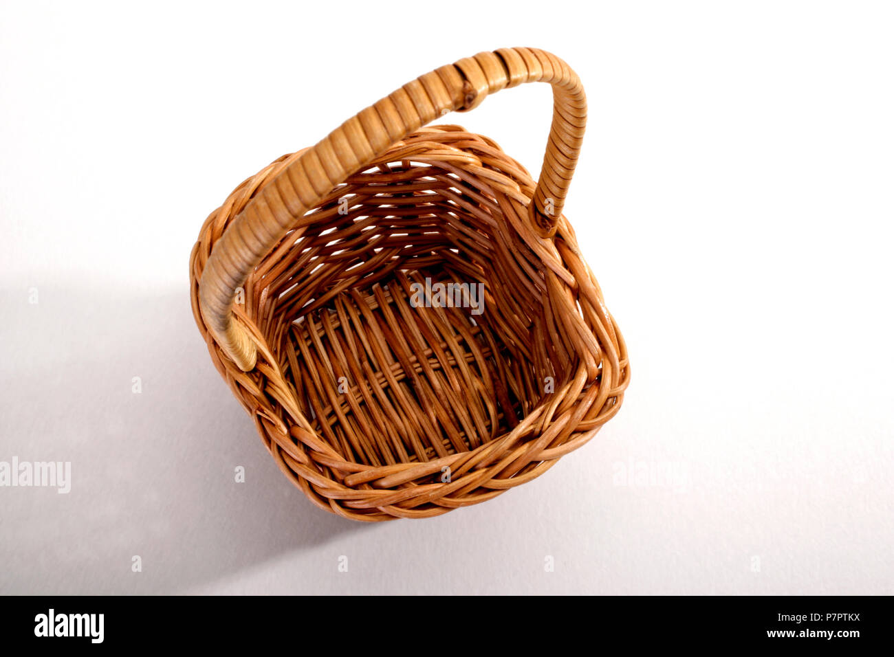 empty basket on white background Stock Photo - Alamy