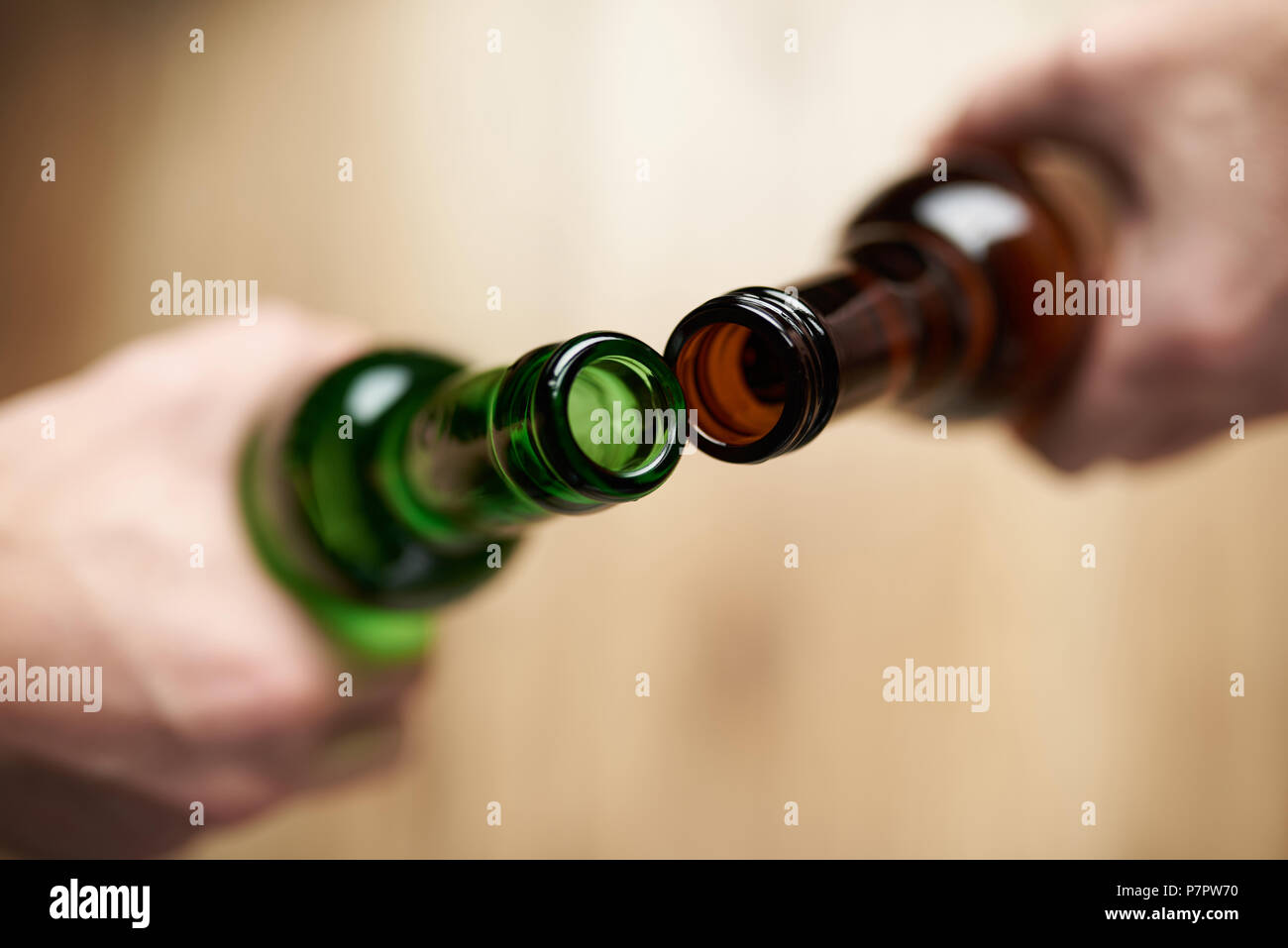 Holding Beer Bottle By The Neck