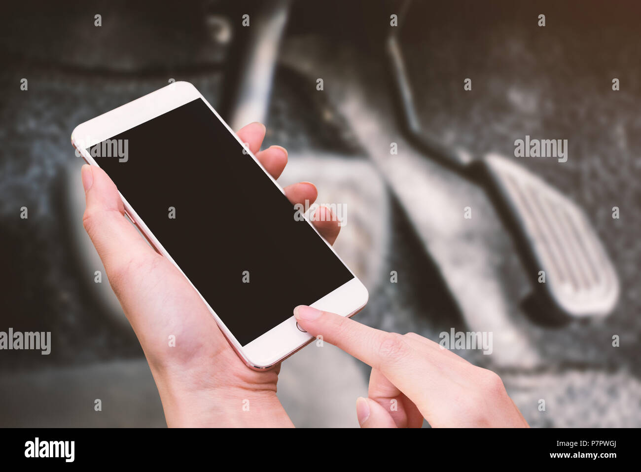 Woman hold smart phone and touch button by hand with blank screen for ...