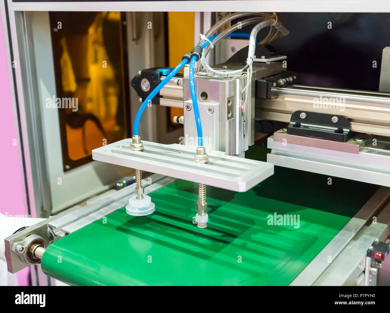 robotic pneumatic piston sucker unit on industrial machine,automation ...