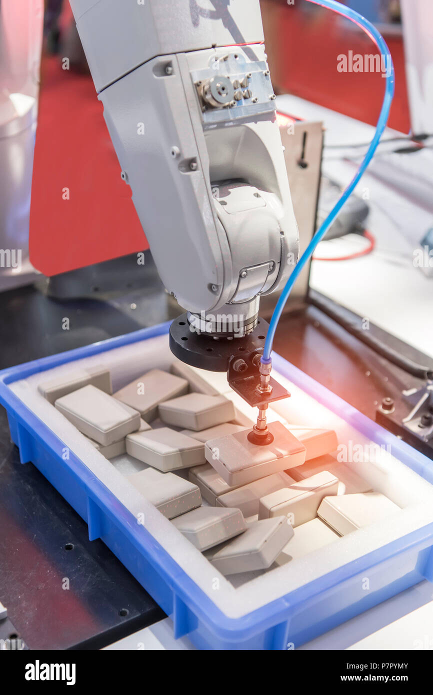 Automatic robot in assembly line working in factory. Smart factory ...