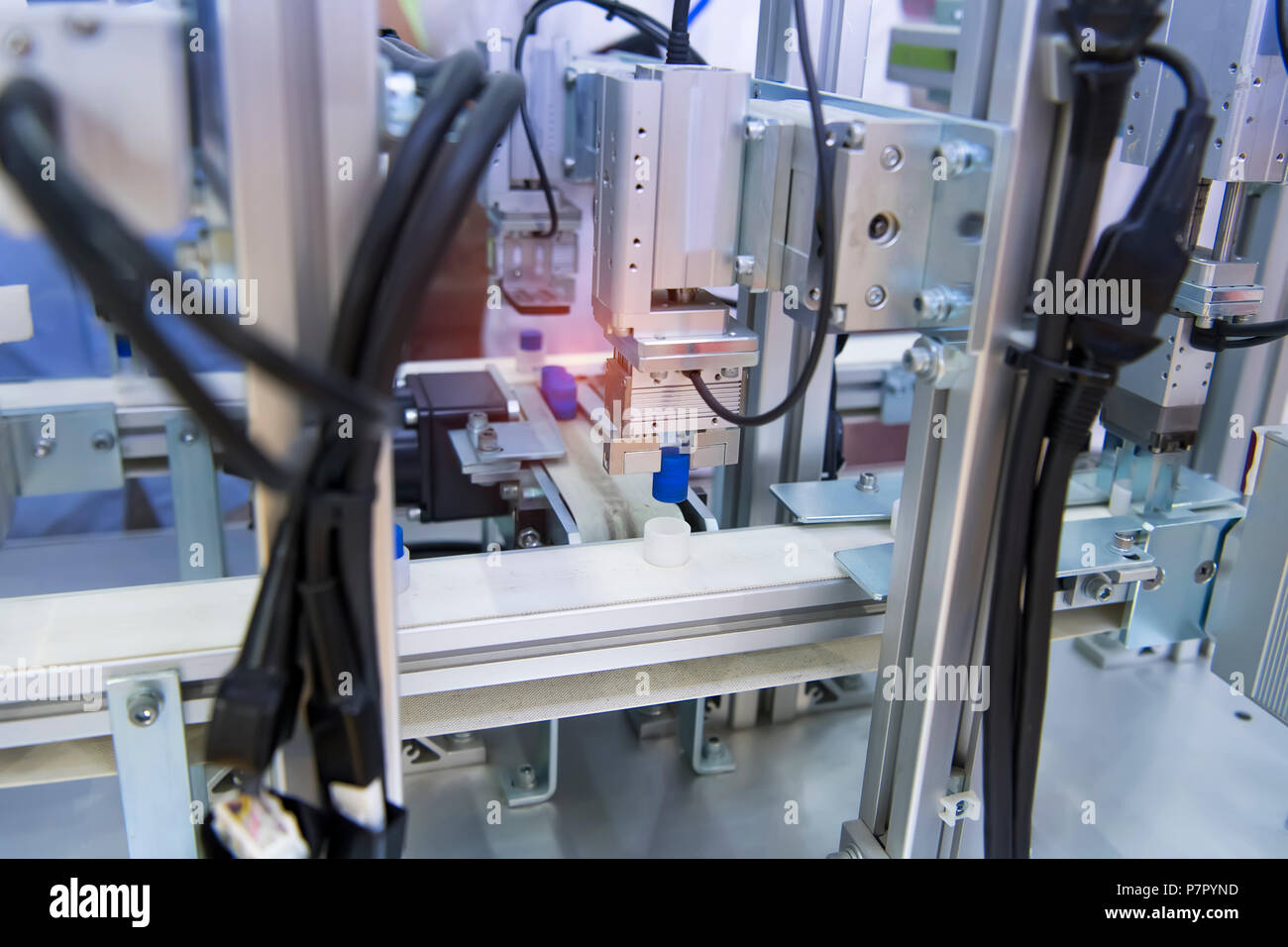 Automatic robot in assembly line working in factory. Smart factory ...